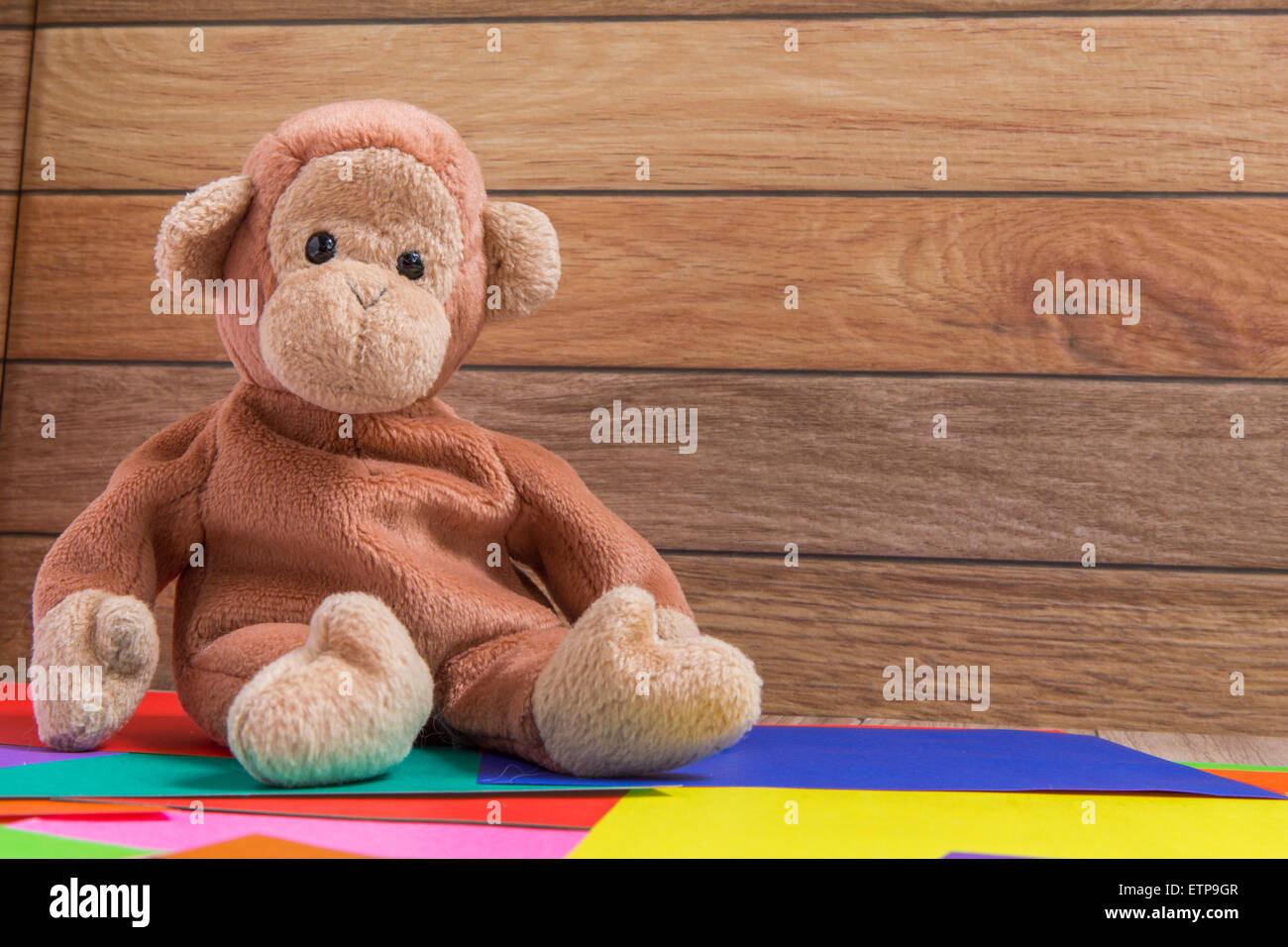 Monkey Doll on Colorful Background Stock Photo - Alamy