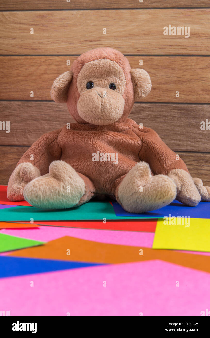 Monkey Doll on Colorful Background Stock Photo - Alamy