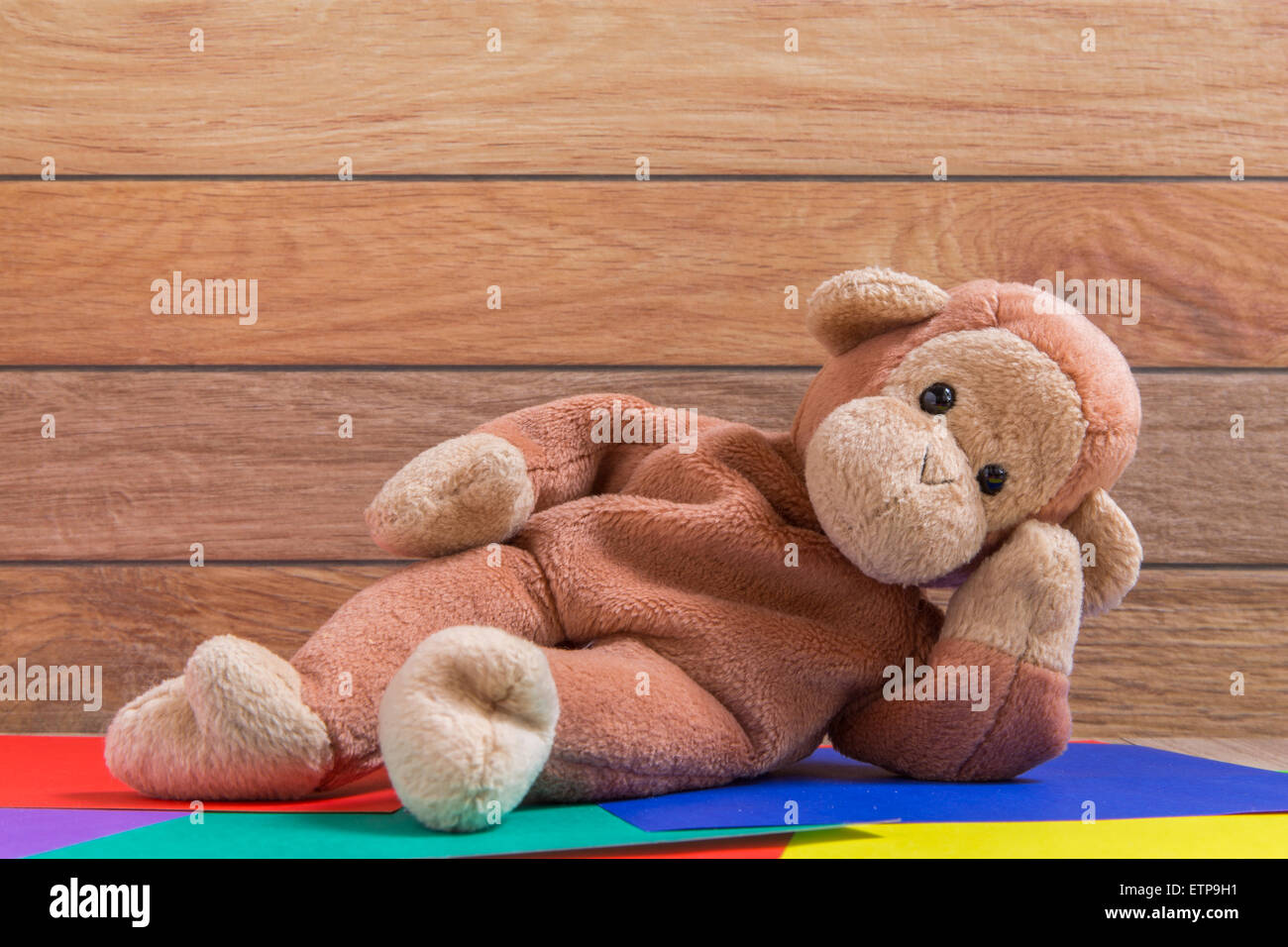 Monkey Doll on Colorful Background Stock Photo - Alamy