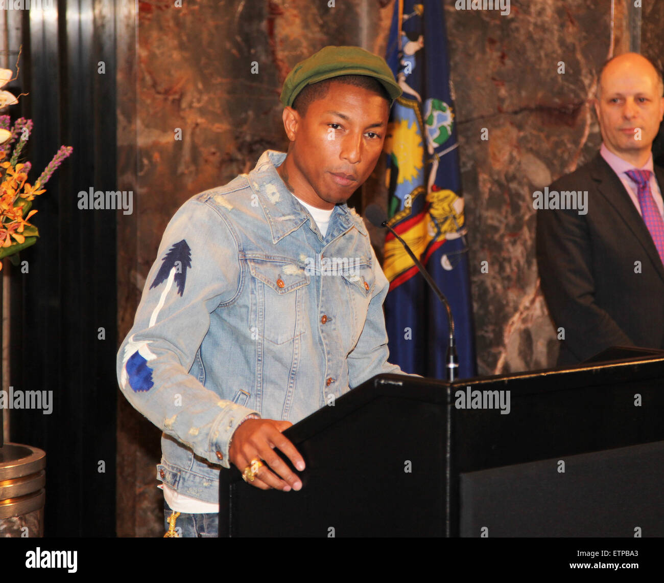 Grammy Award-winning musician Pharrell Williams lights the Empire State ...