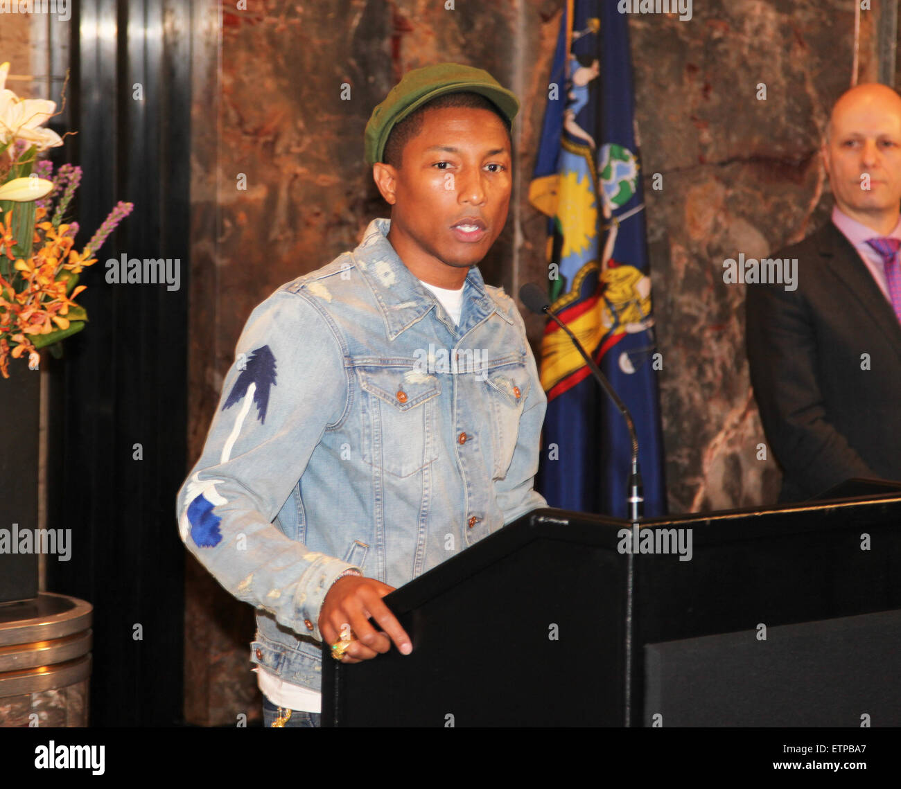 Grammy Award-winning musician Pharrell Williams lights the Empire State ...