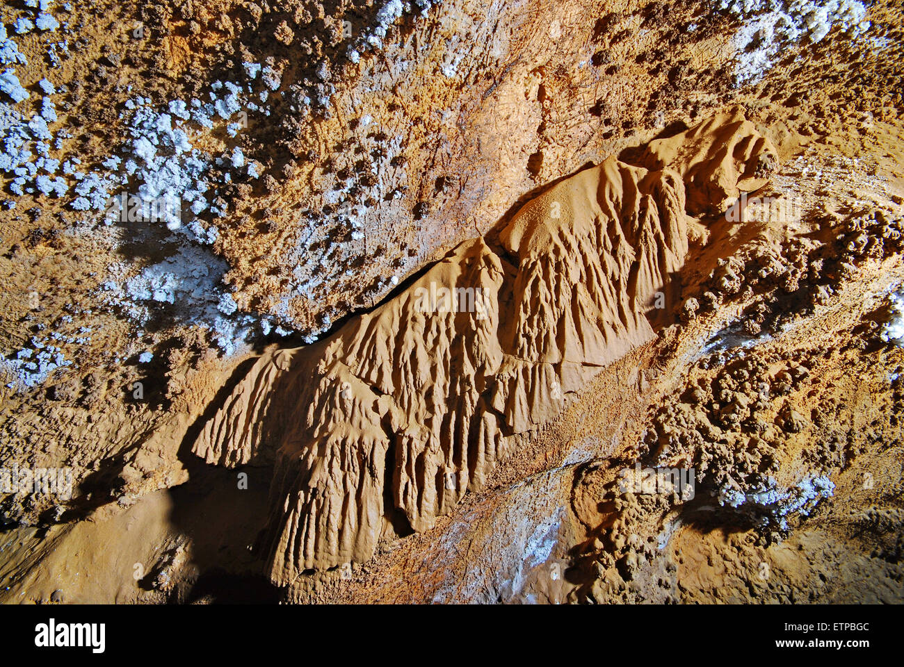 Clay depositions and crystals in a cave Stock Photo - Alamy