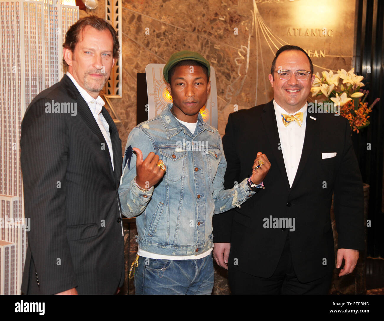 Grammy Award-winning musician Pharrell Williams lights the Empire State ...