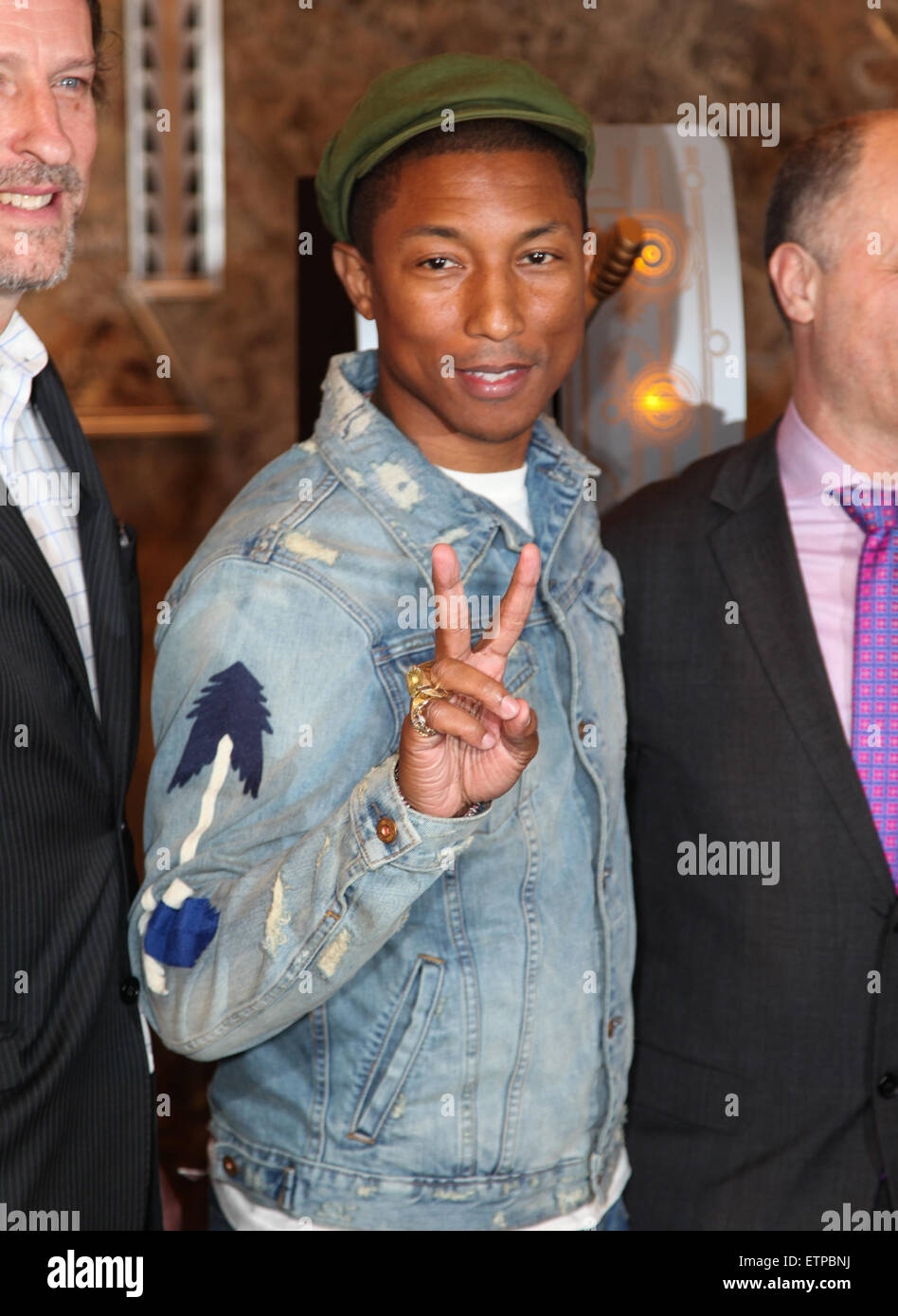 Grammy Award-winning musician Pharrell Williams lights the Empire State ...