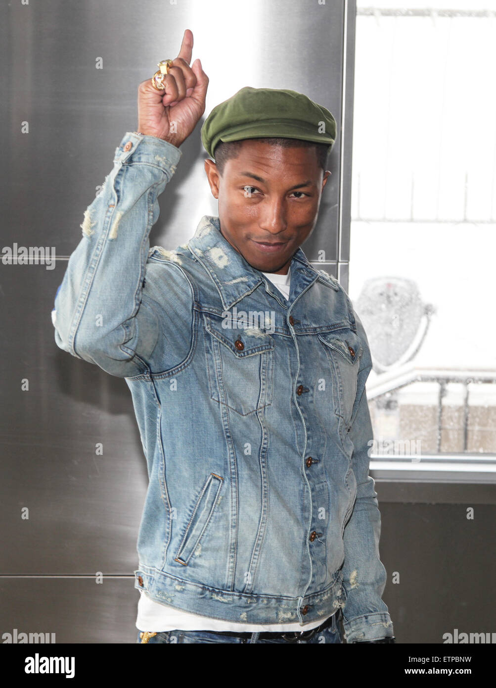 Grammy Award-winning musician Pharrell Williams lights the Empire State ...