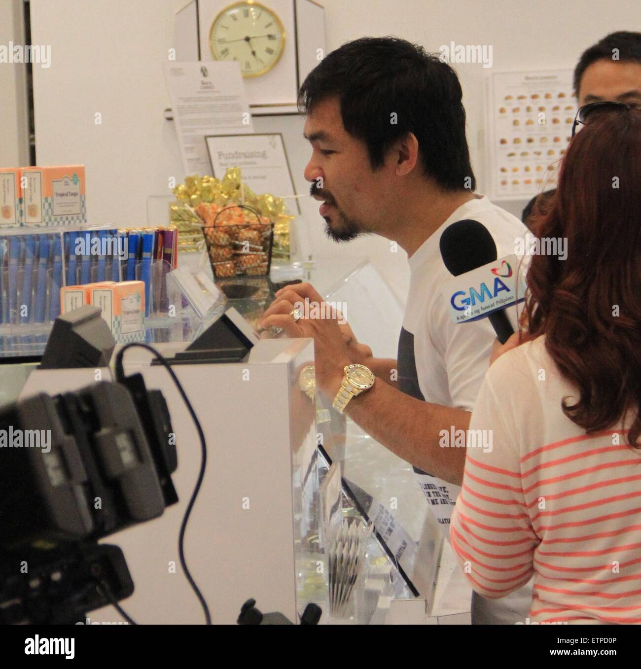 Manny Pacquiao stops by 'See's Candies' for something sweet at The ...
