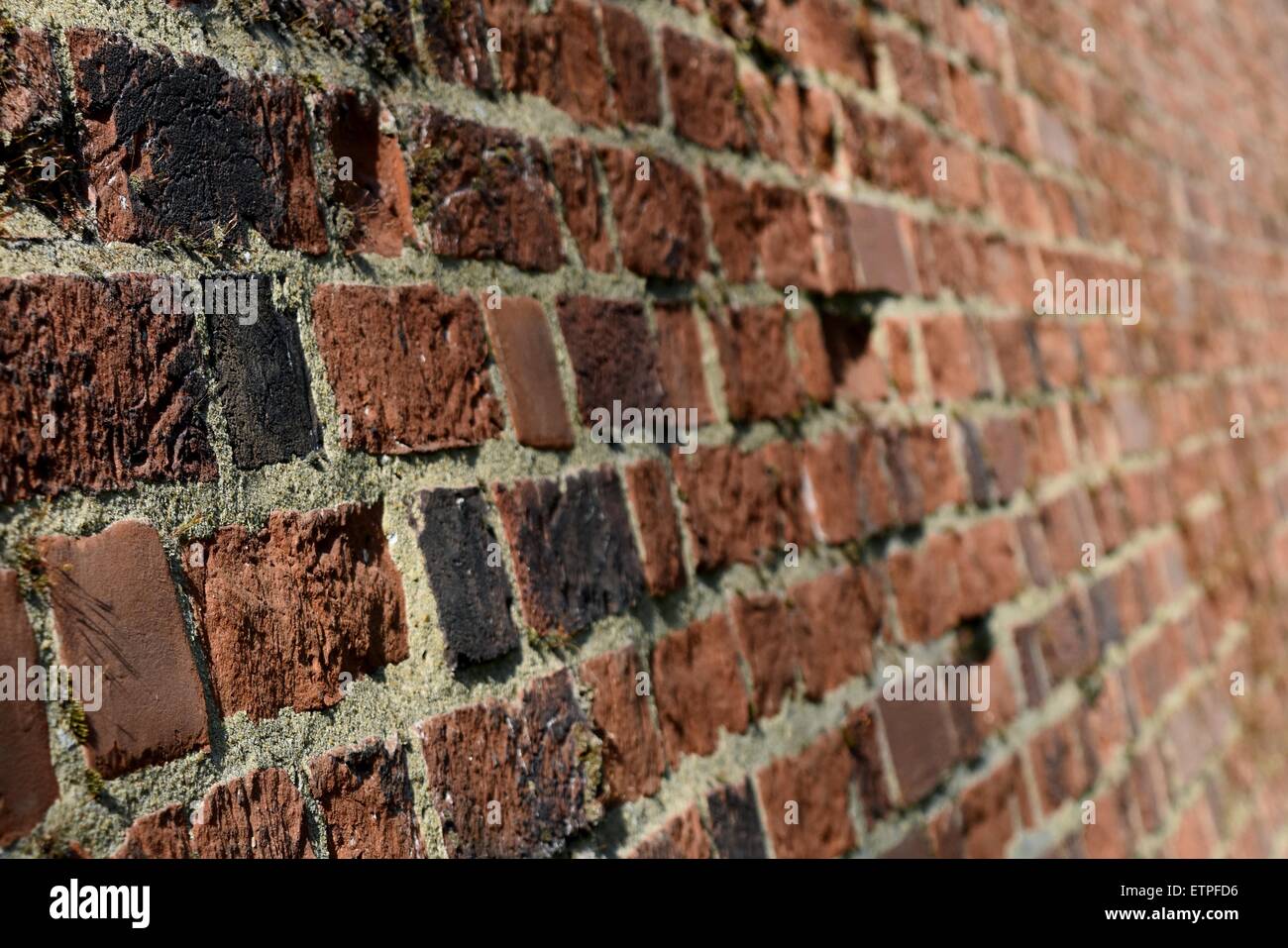 Brick wall at an angle Stock Photo - Alamy