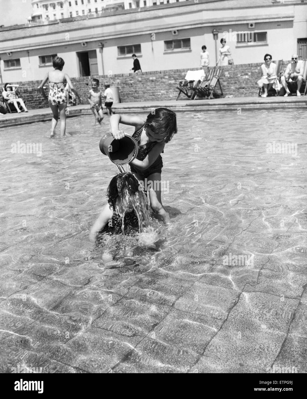 Children at seaside in 1960s hi-res stock photography and images - Alamy