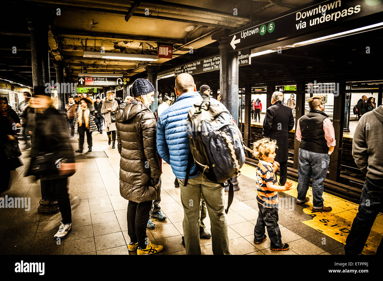 People wait for subway train in New York City Stock Photo - Alamy