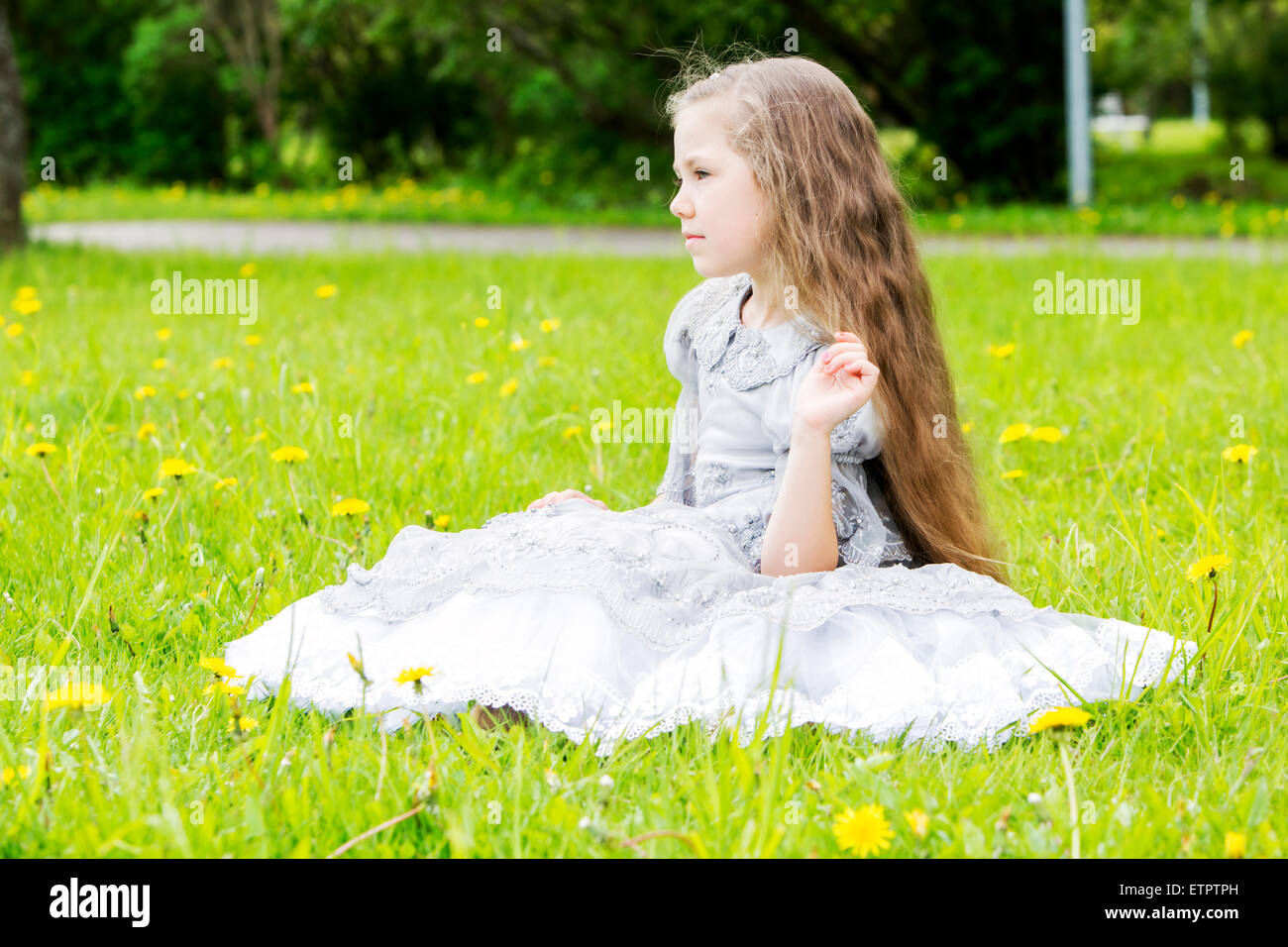 Playful princess is looking directly at someone Stock Photo - Alamy