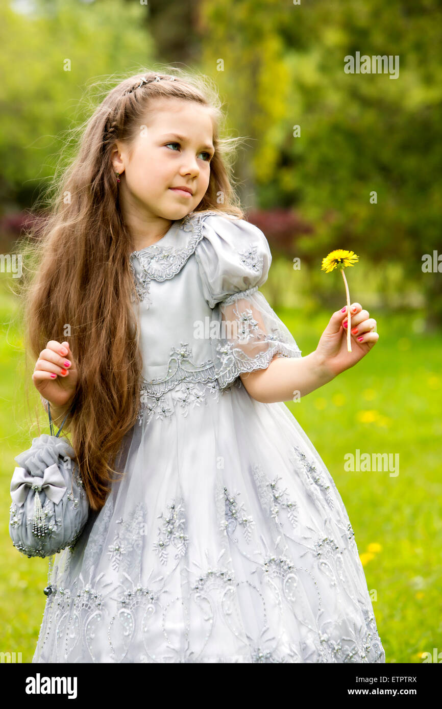 Sweet child posing like a frightened princess Stock Photo - Alamy