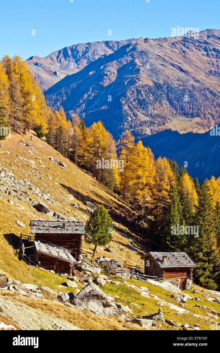 Alpine huts on steep slopes Stock Photo - Alamy
