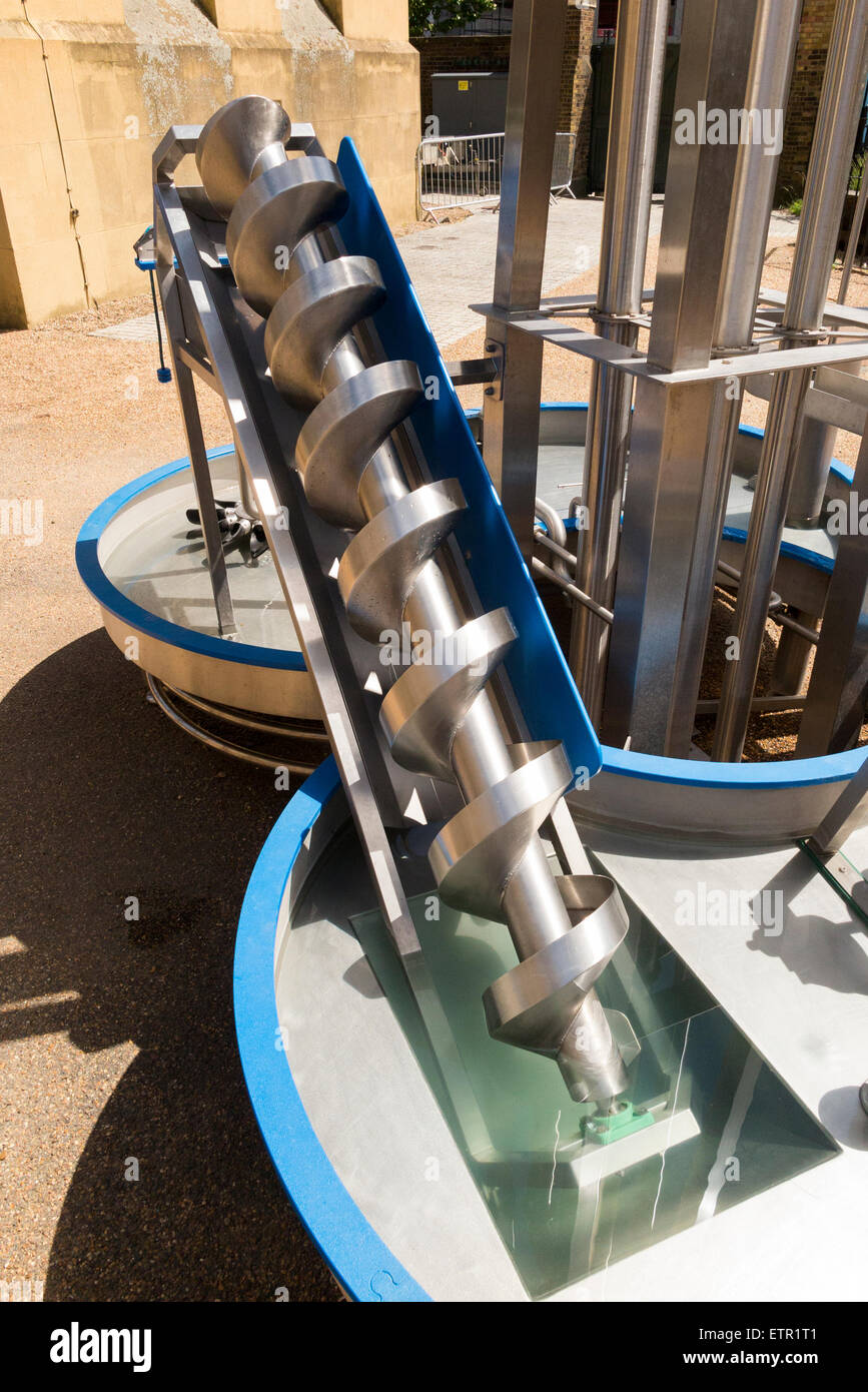Archimedes water screw in Splash zone of The Waterwheel Courtyard. The ...