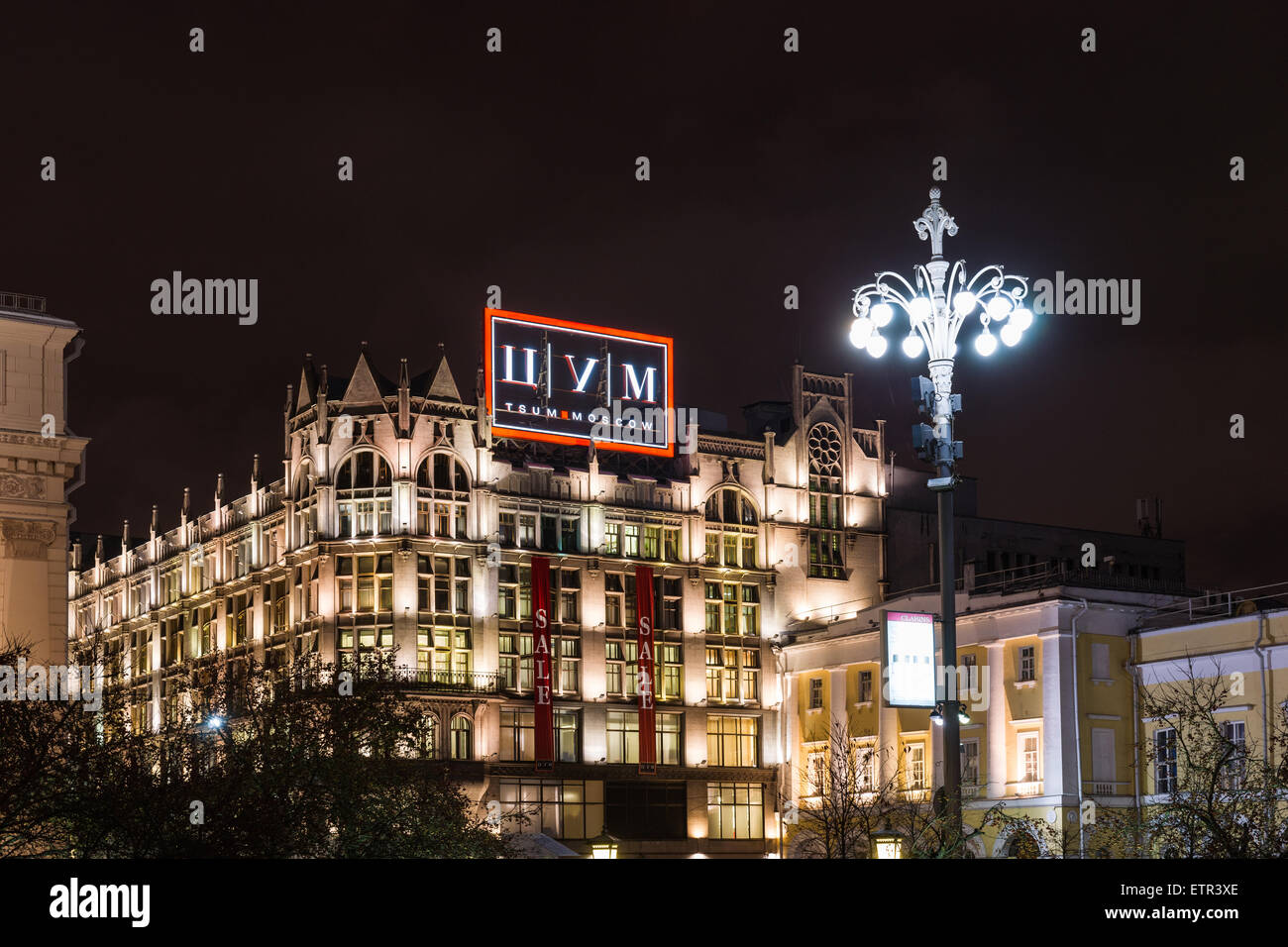 Illuminated building of the Central Department Store (TsUM) of Moscow ...