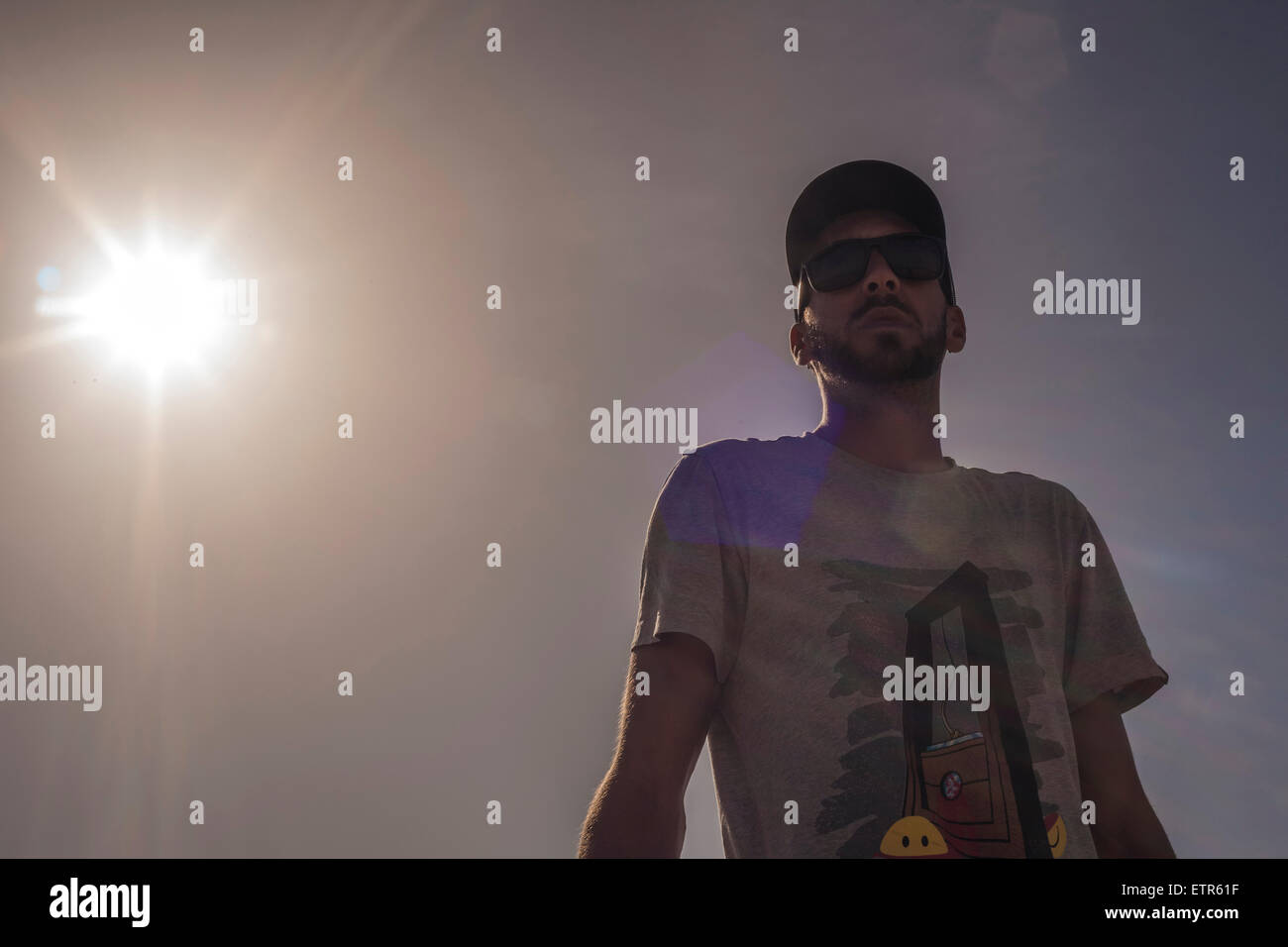 Lifestyle, urban scene, male, young, men, sunglass, observing, facing ...