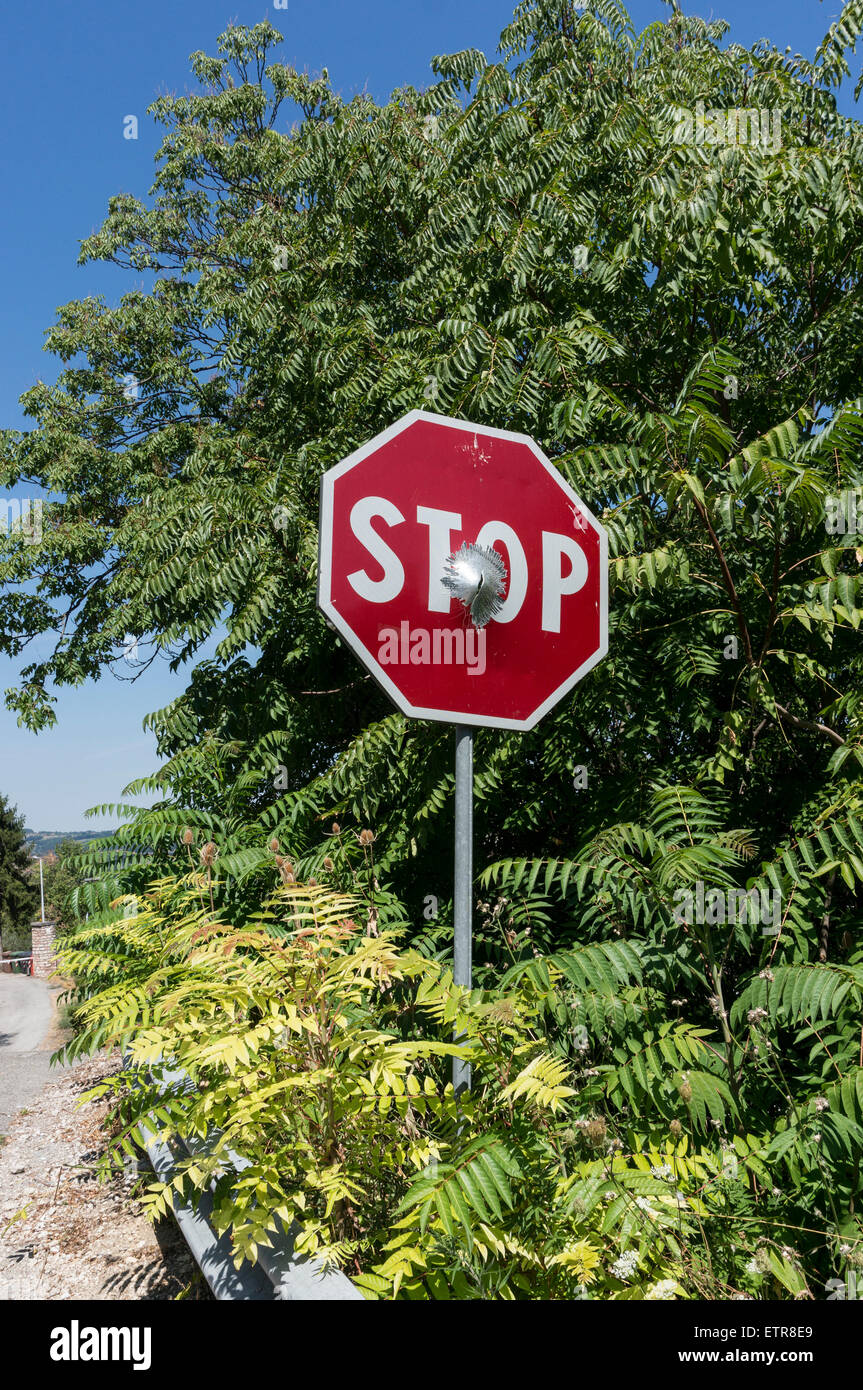 Stop sign with bullet holes hi-res stock photography and images - Alamy