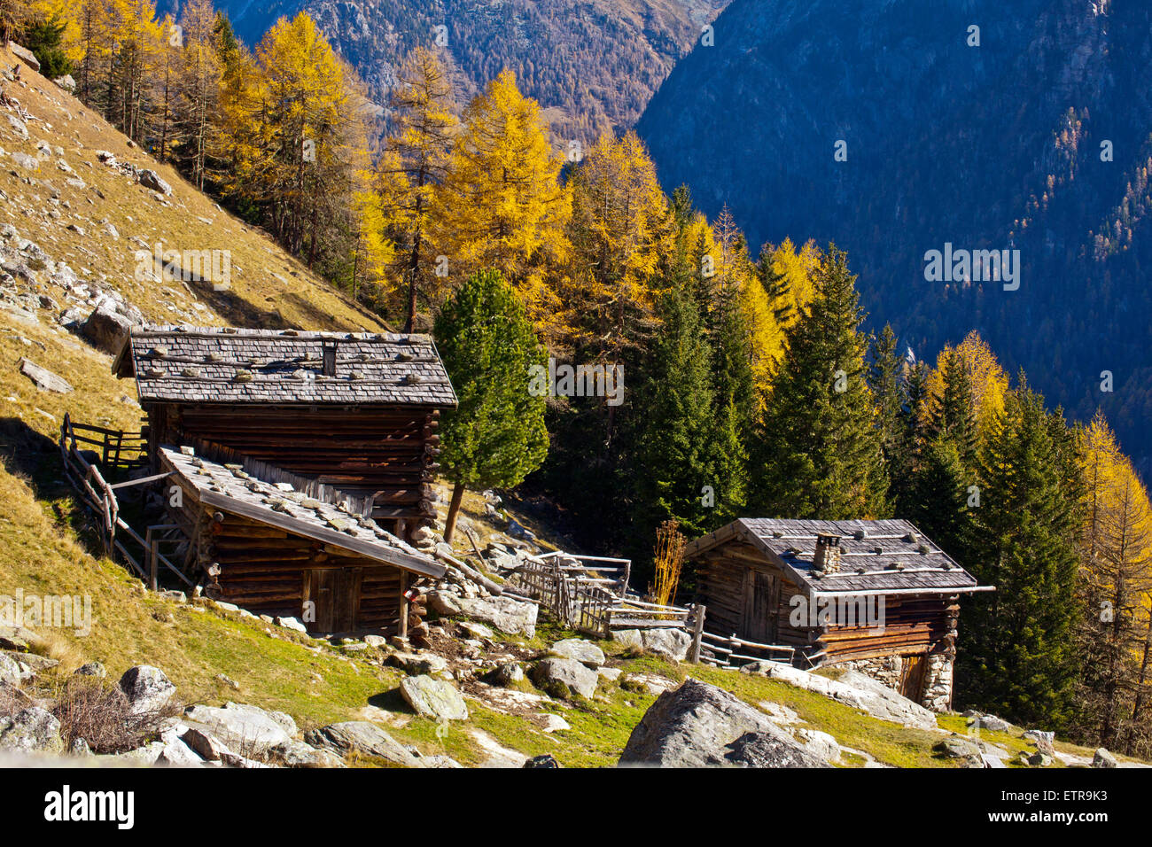 Alpine huts on steep slopes Stock Photo - Alamy