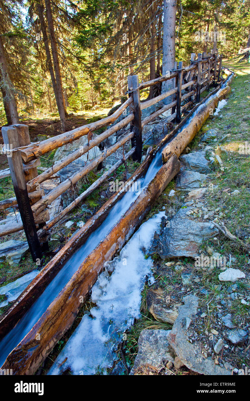 Water pipe at fence Stock Photo - Alamy
