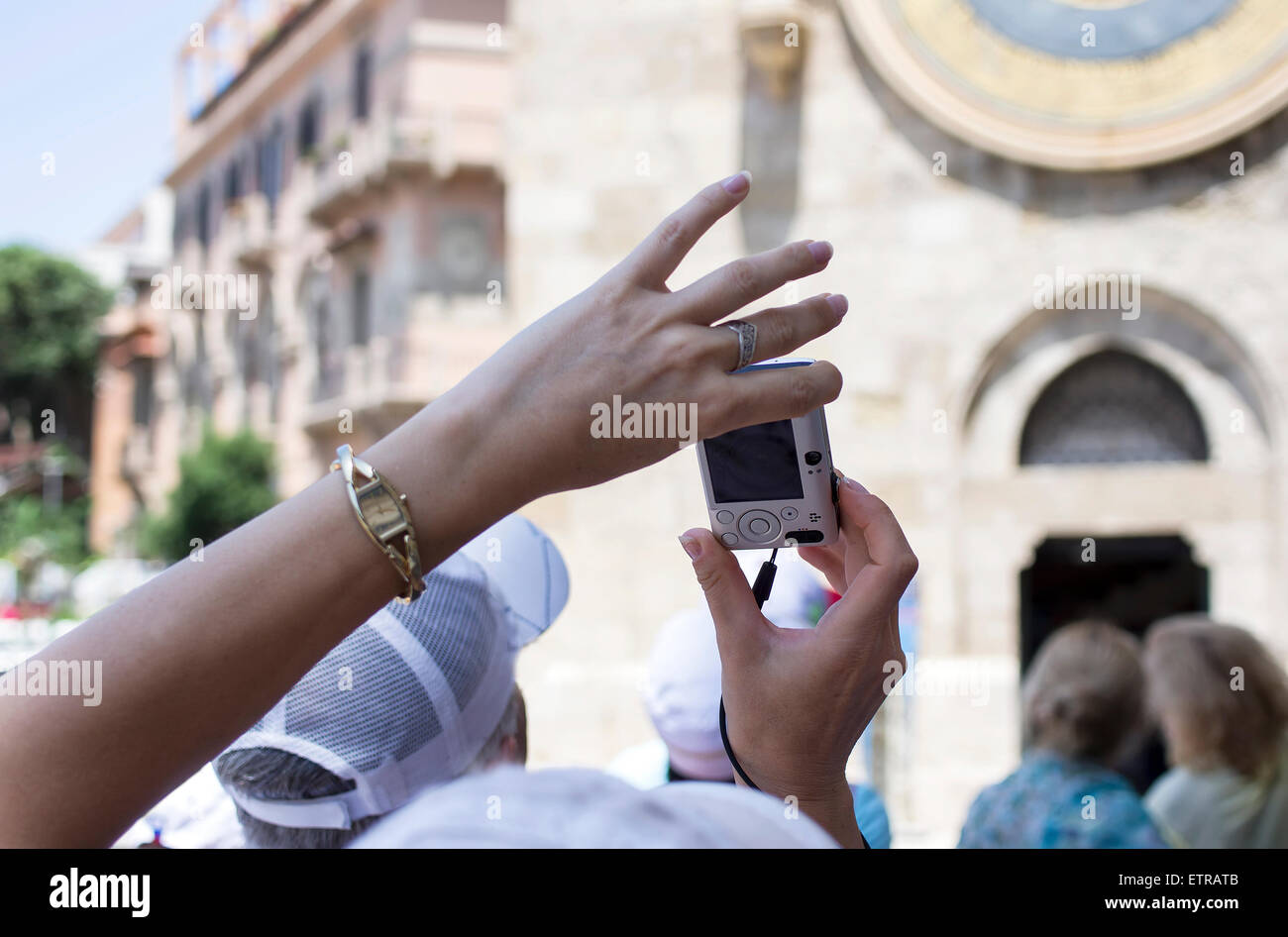 Woman taking pictures Stock Photo - Alamy