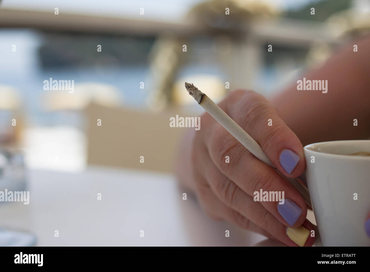 Female Hand With Cigarette Stock Photo - Alamy