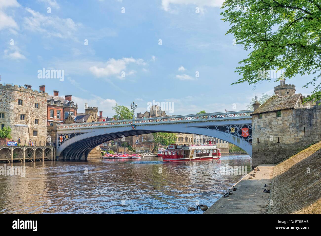 Lendal Bridge, York, tourist site with pleasure boat passing below ...
