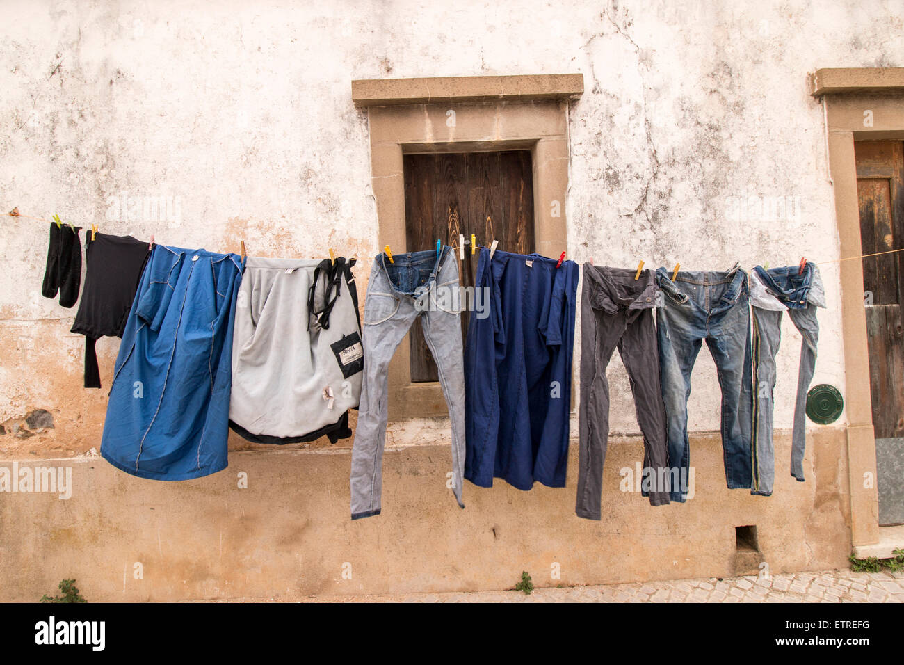 Close view of laundry hanging on a line to dry, on a poor country Stock ...