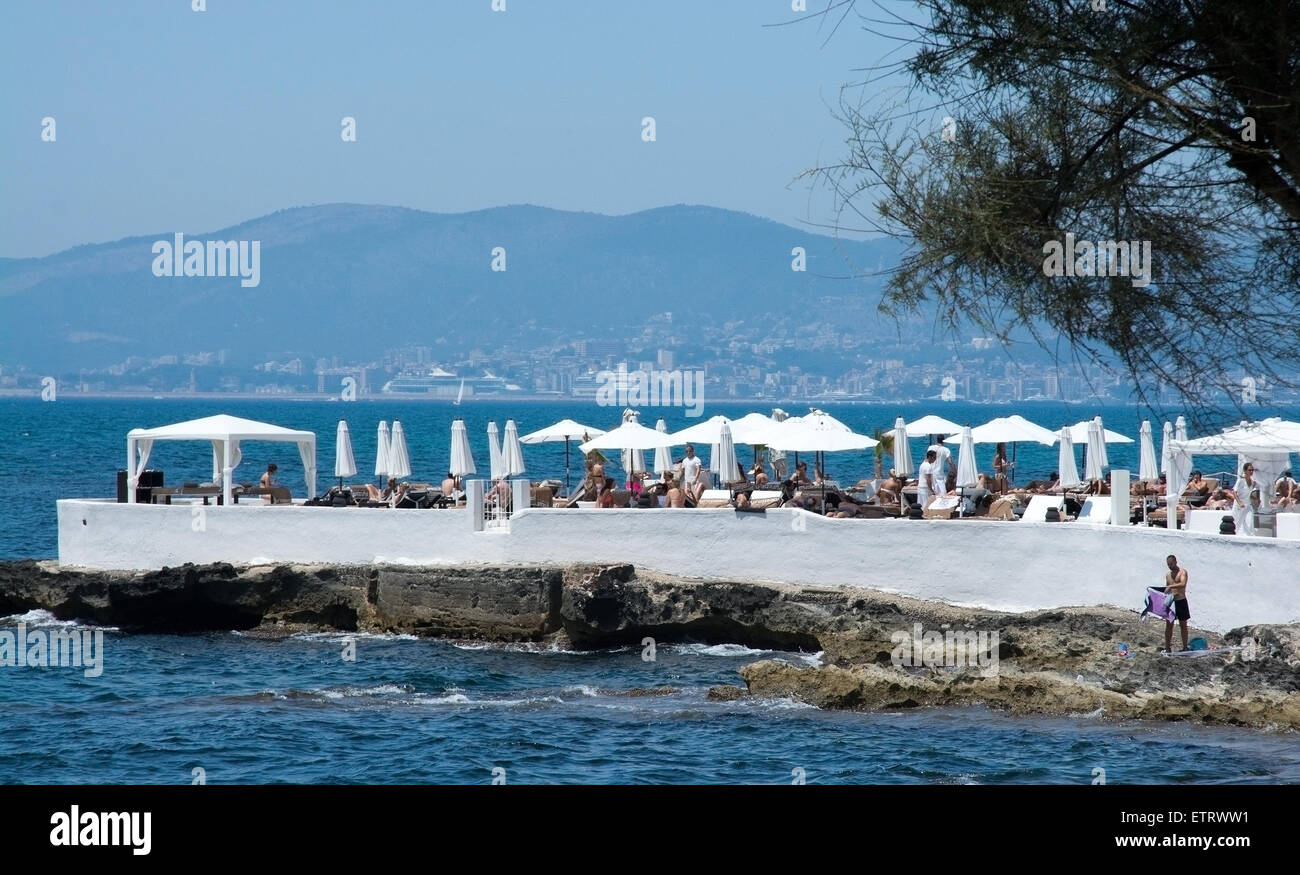 Puro beach popular exclusive beach club with people on a hot summer day ...