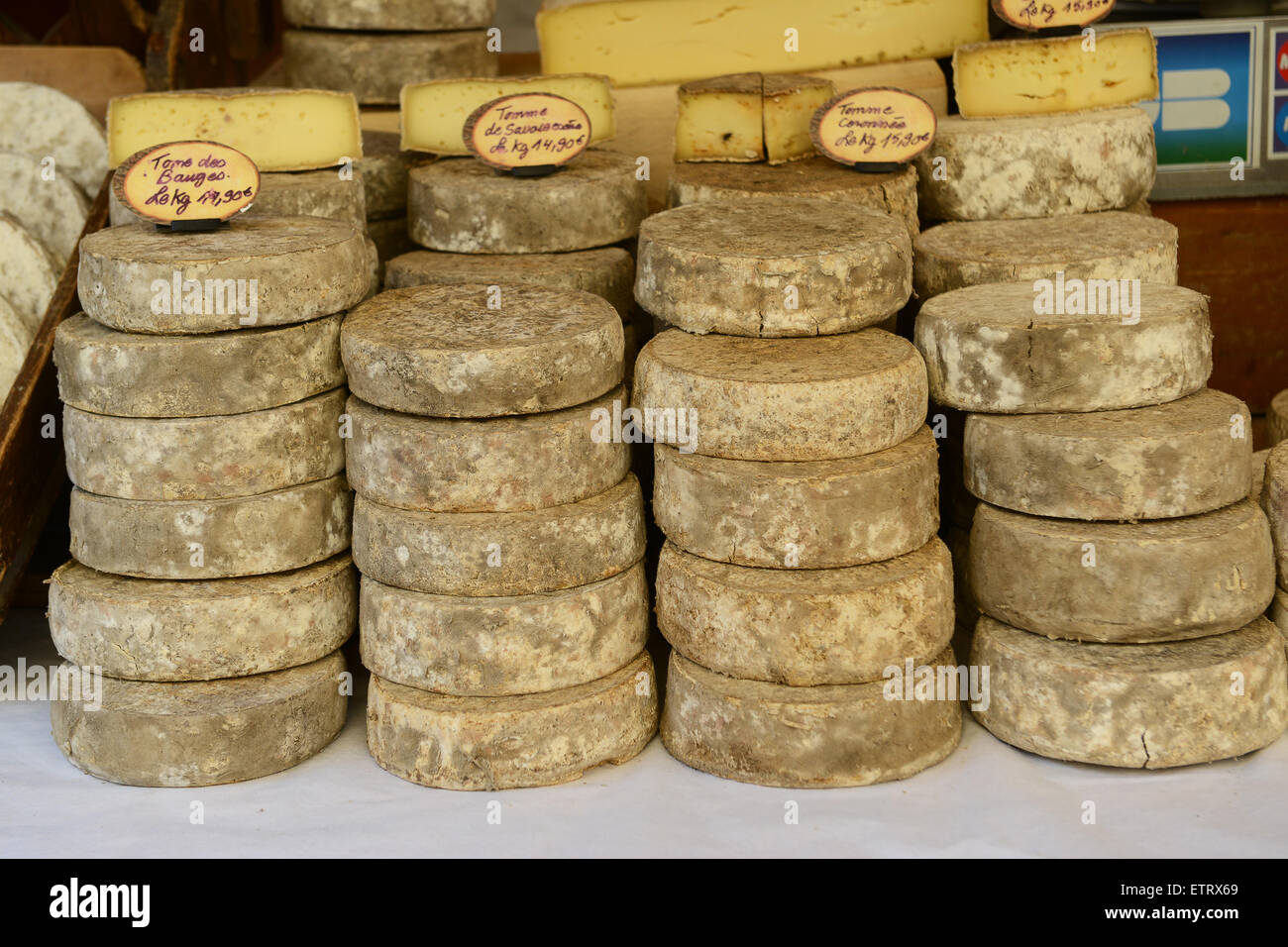 Hand made cheese cheeses on sale at French market in France Stock Photo ...