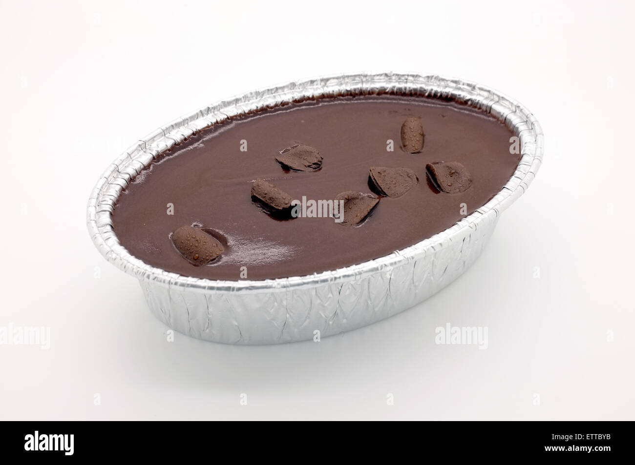 Chocolate cake in foil oval box isolated on white background Stock ...