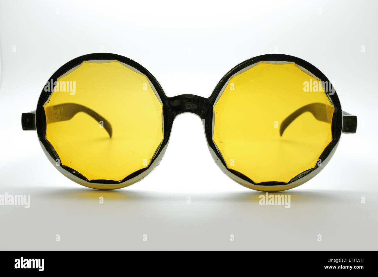 Yellow retro / vintage glasses / eye wear, black frame Stock Photo - Alamy