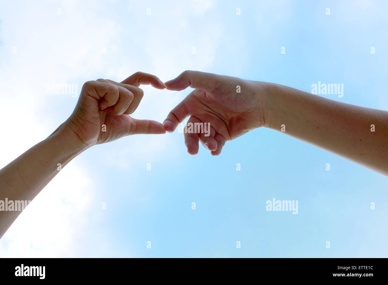 Hands showing heart sign over hi-res stock photography and images - Alamy