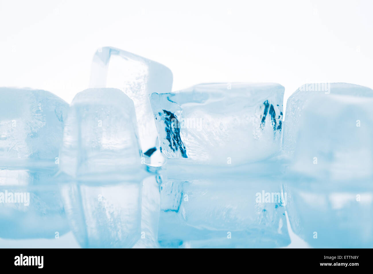 Ice cubes on a white background Stock Photo - Alamy