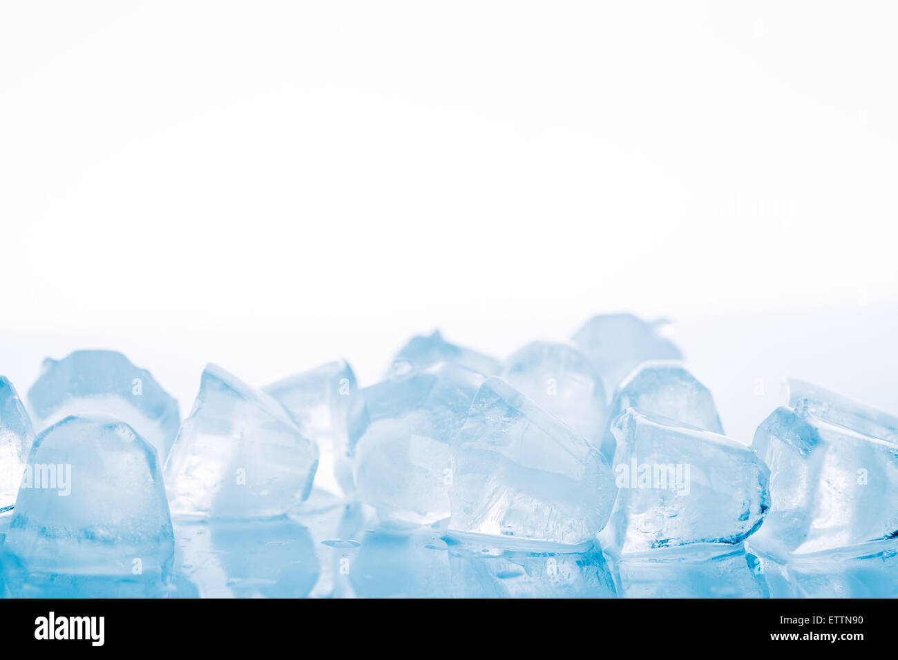 Ice cubes on a white background Stock Photo - Alamy