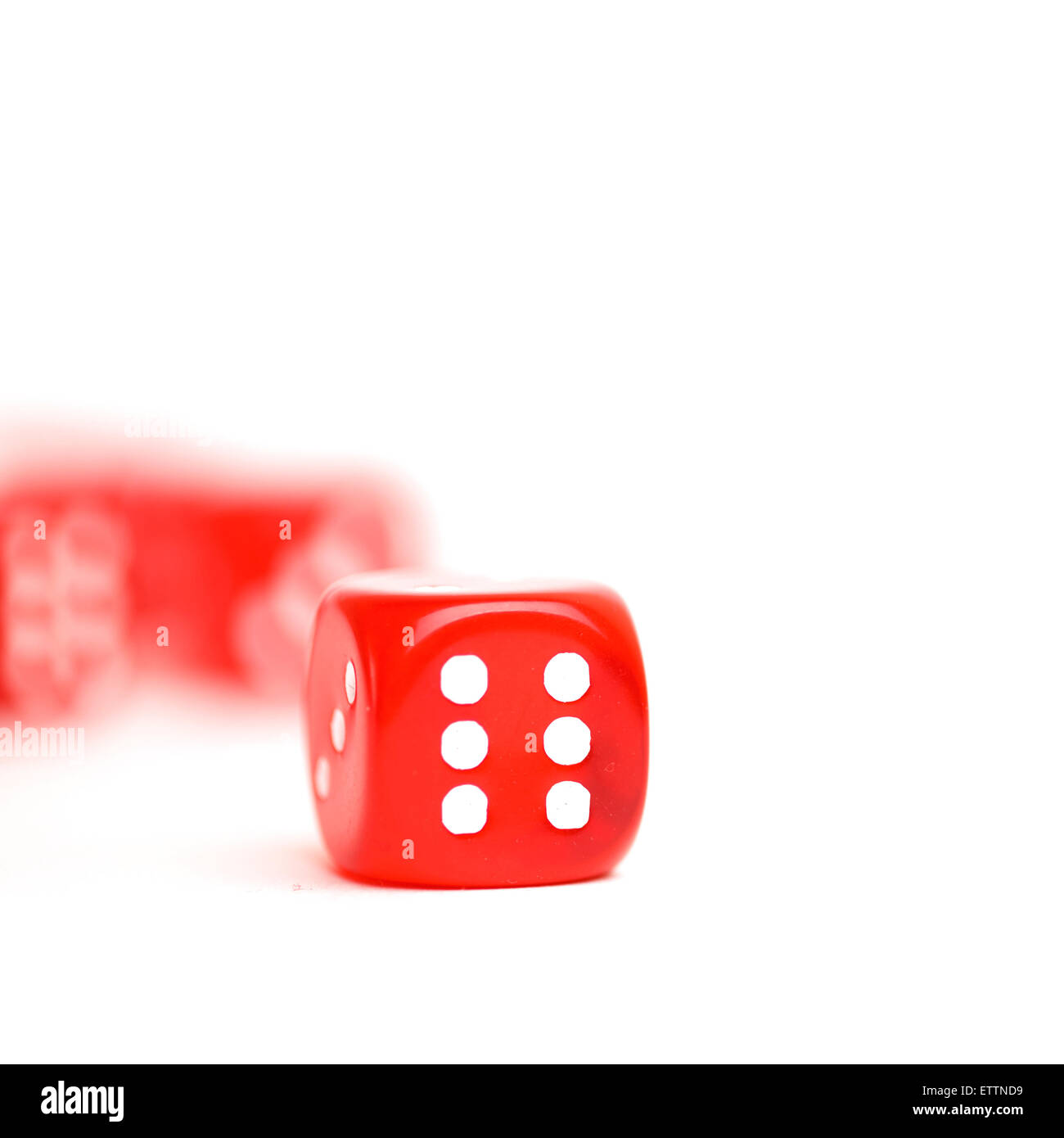 rolling red dice isolated on white Stock Photo - Alamy