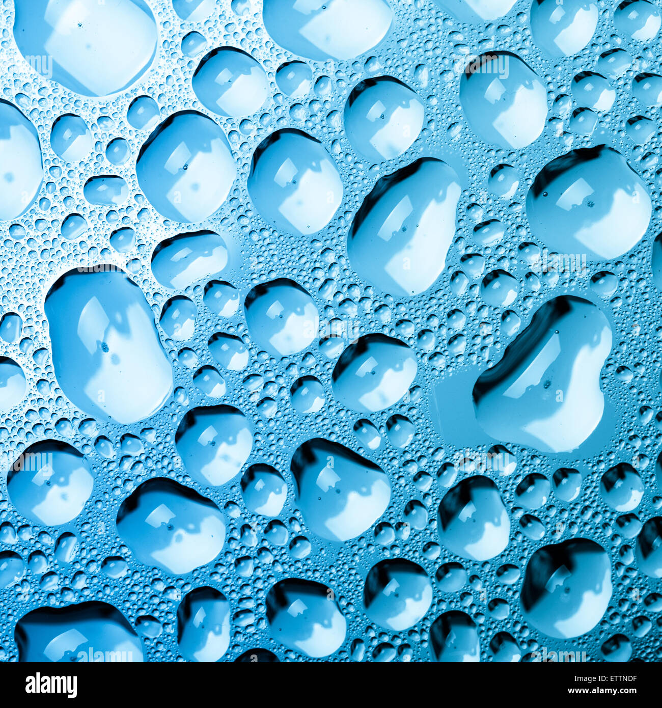 Blue water drops background Stock Photo - Alamy