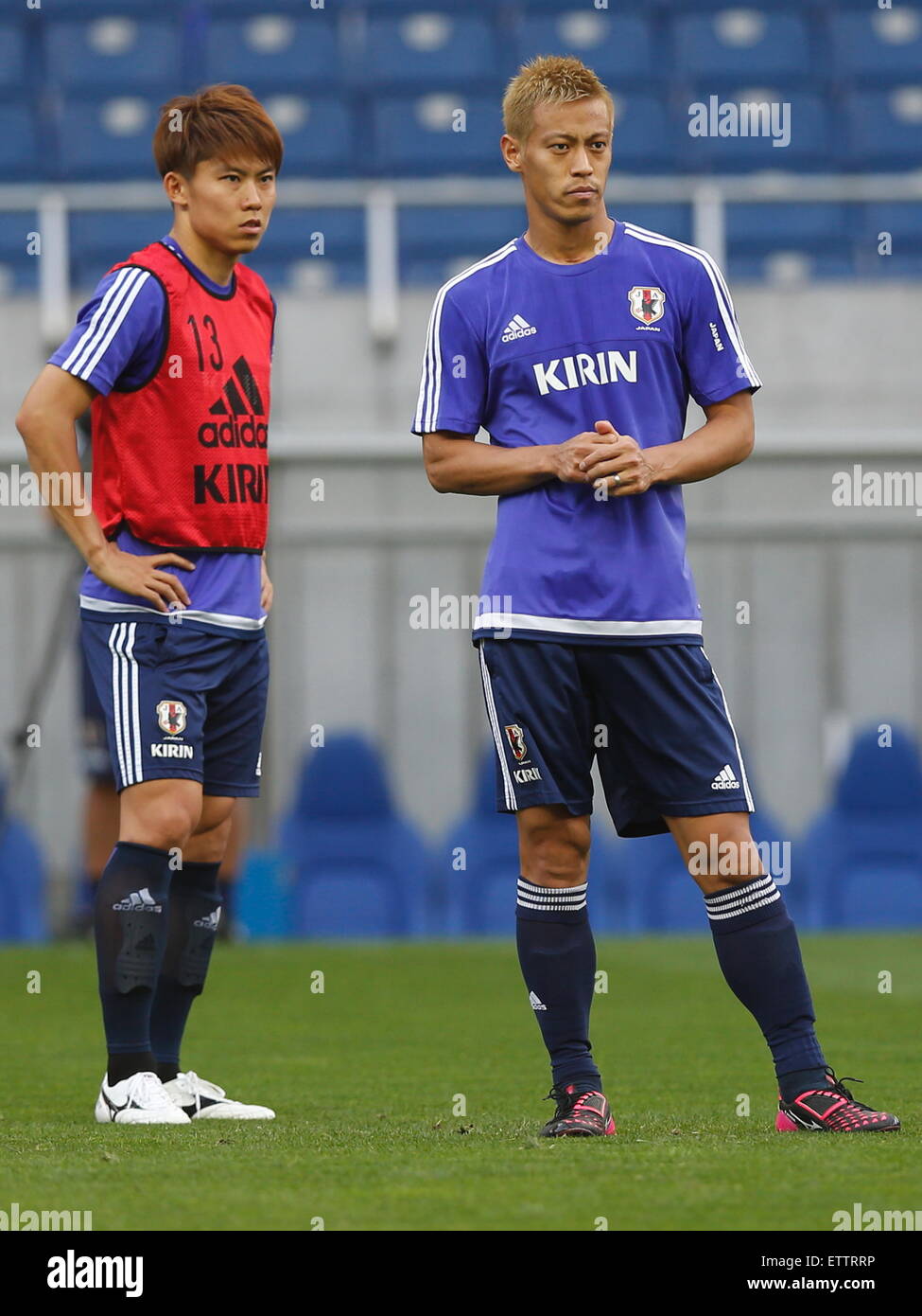 Saitama, Japan. 15th June, 2015. (L-R) Kosuke Ota (JPN), Keisuke Honda (JPN) Football/Soccer ...
