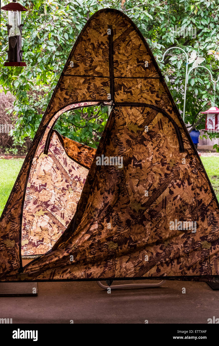 A hunting hide tent, used for concealment to photograph birds in a yard ...