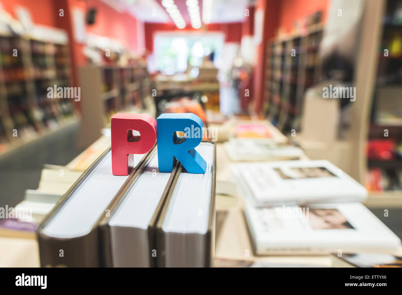 Letters PR in a bookstore Stock Photo - Alamy