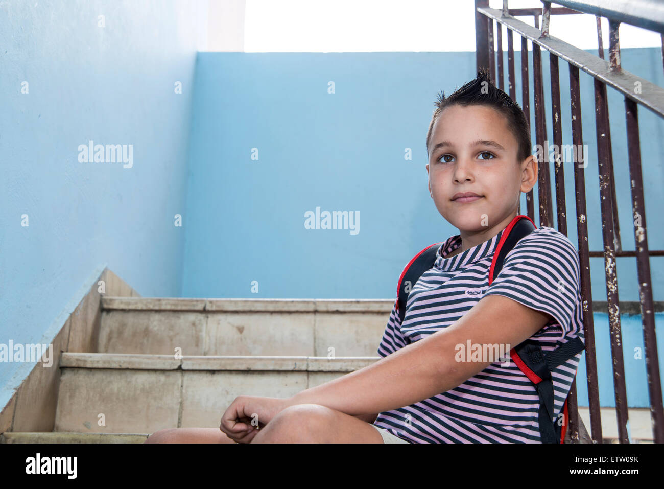 Latin boy with school backpack Stock Photo - Alamy