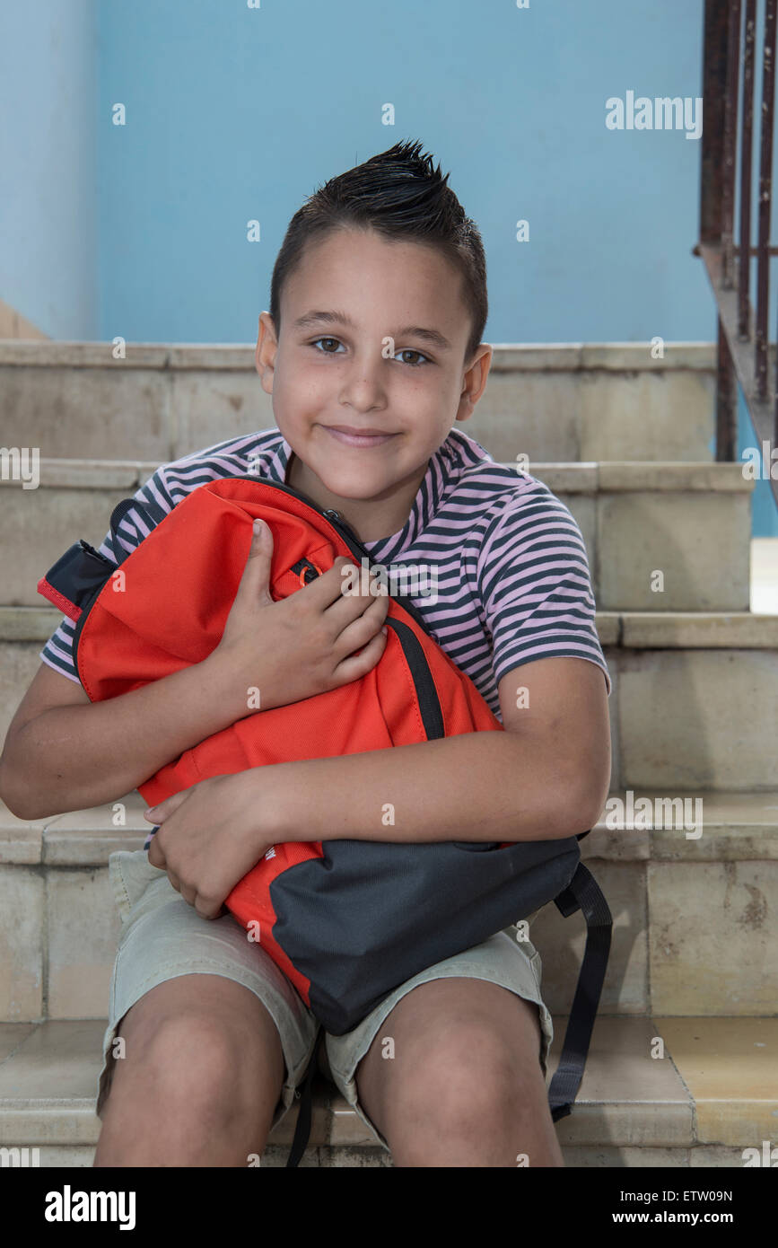 Latin boy with school backpack Stock Photo - Alamy