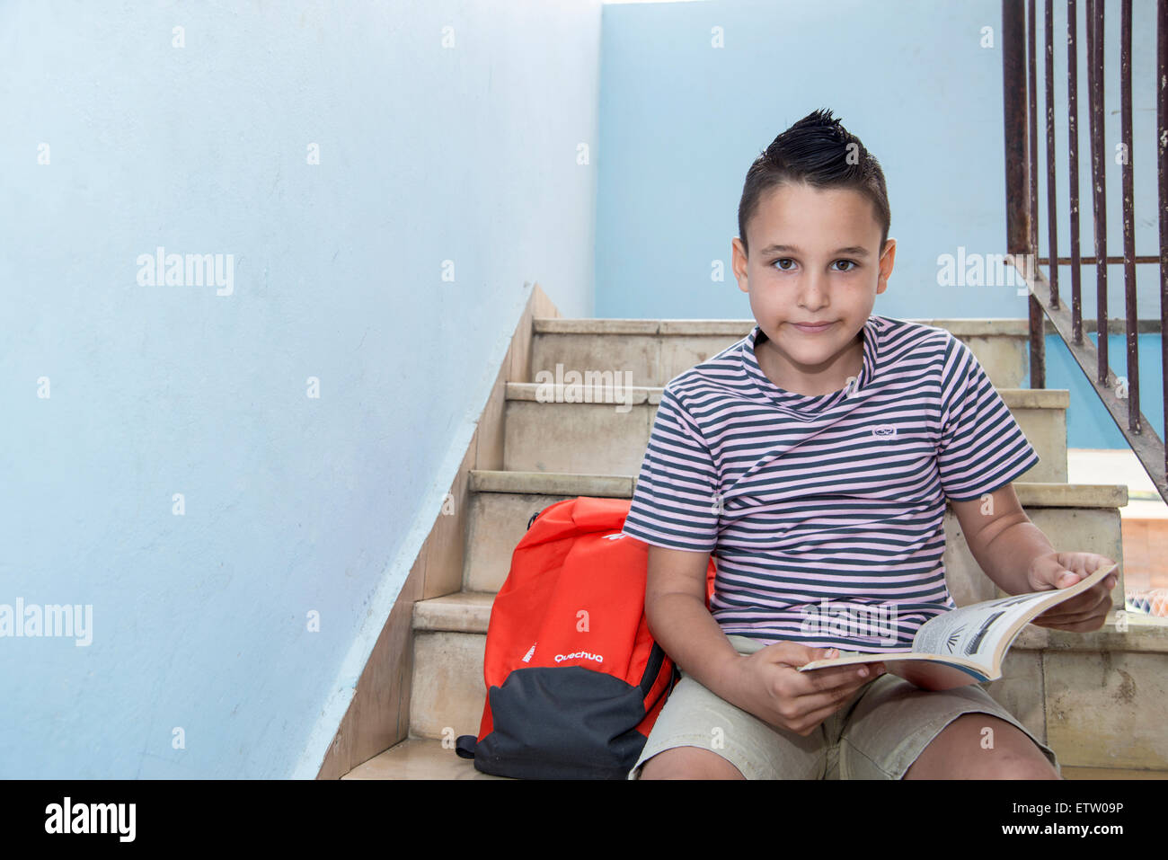 Latin boy with school backpack Stock Photo - Alamy