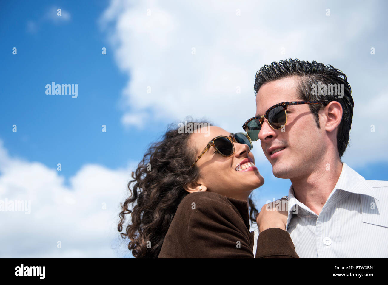 Latin couple outdoors Stock Photo - Alamy