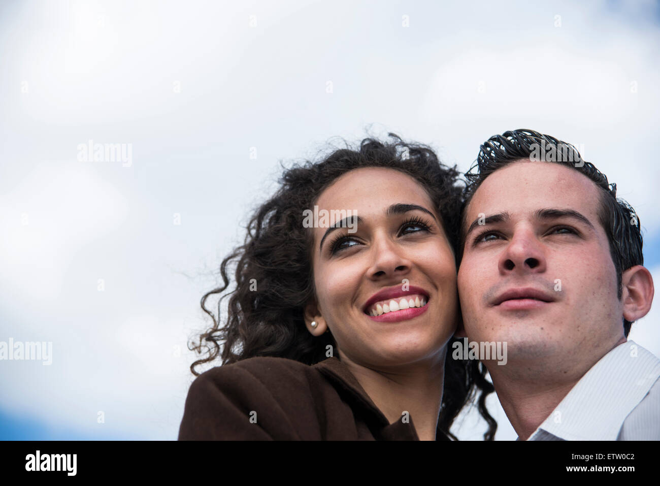 Latin couple outdoors Stock Photo - Alamy