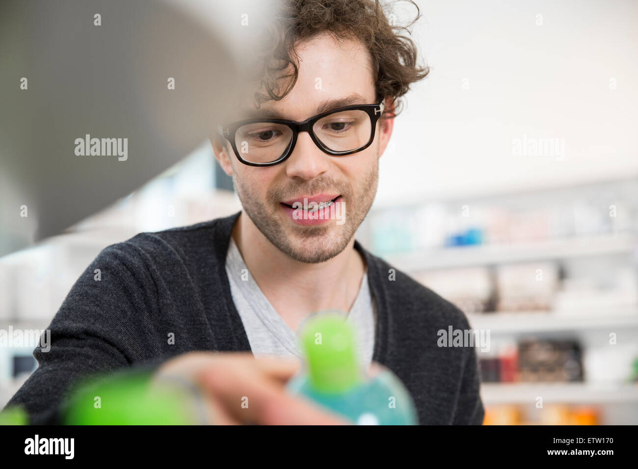Comparing products hi-res stock photography and images - Alamy