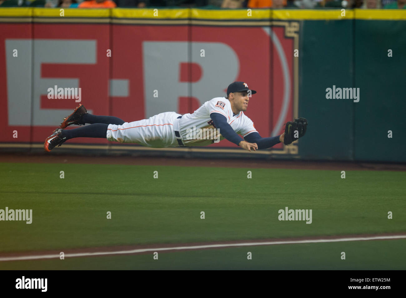 Fielder diving to catch ball hi-res stock photography and images - Alamy