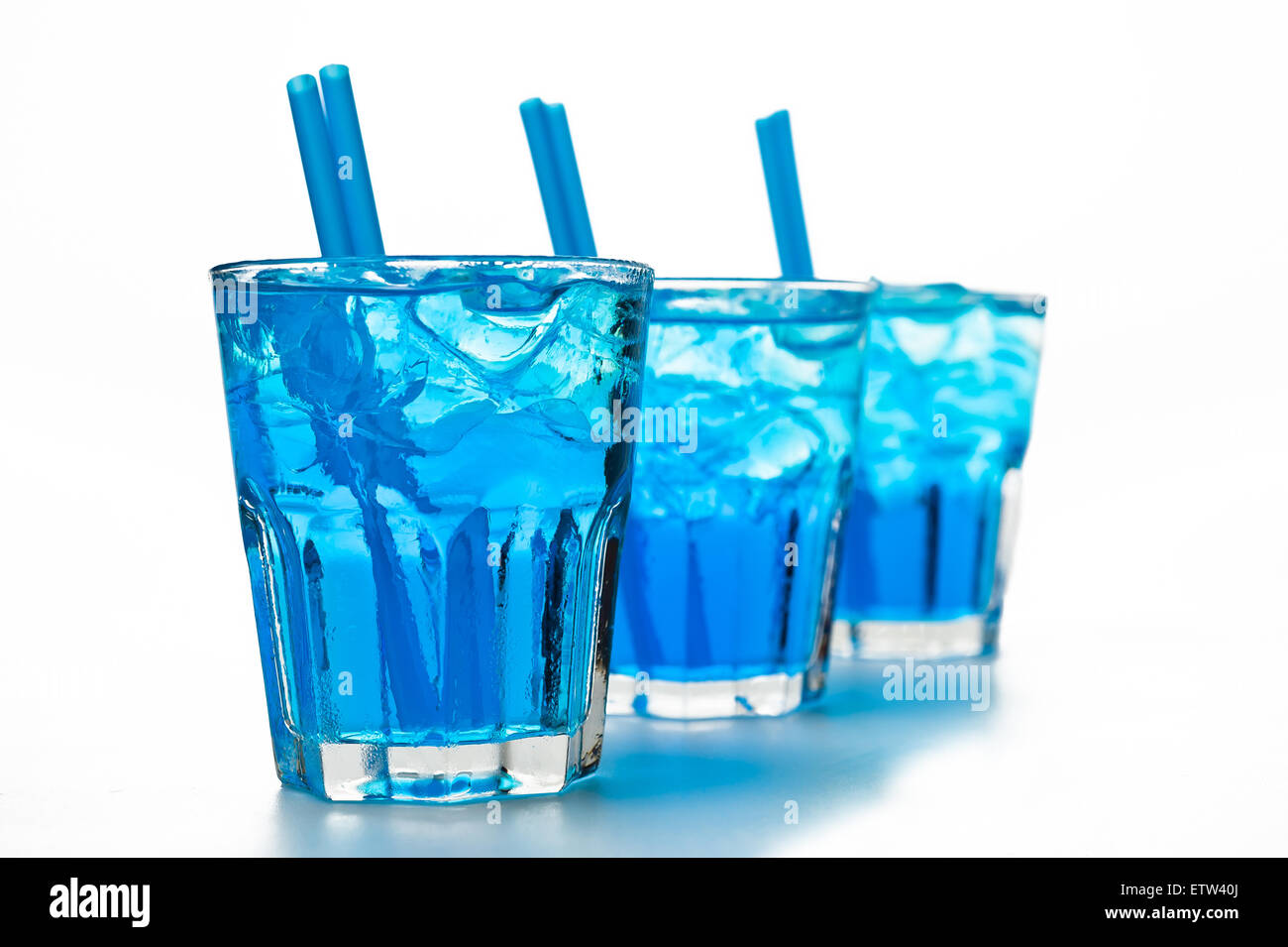 Blue cocktails isolated on white Stock Photo - Alamy