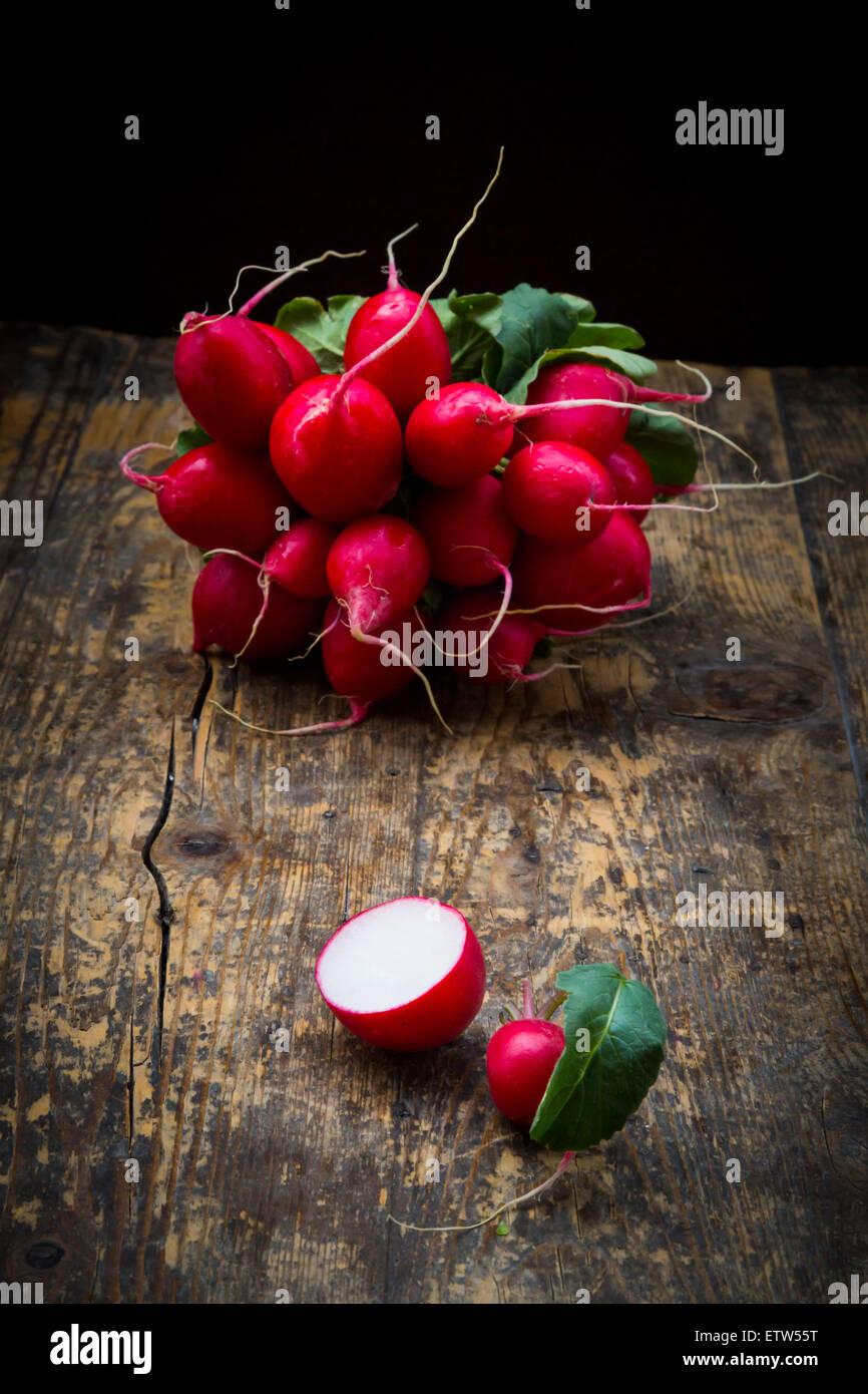 Bunch of organic radish on wood Stock Photo - Alamy