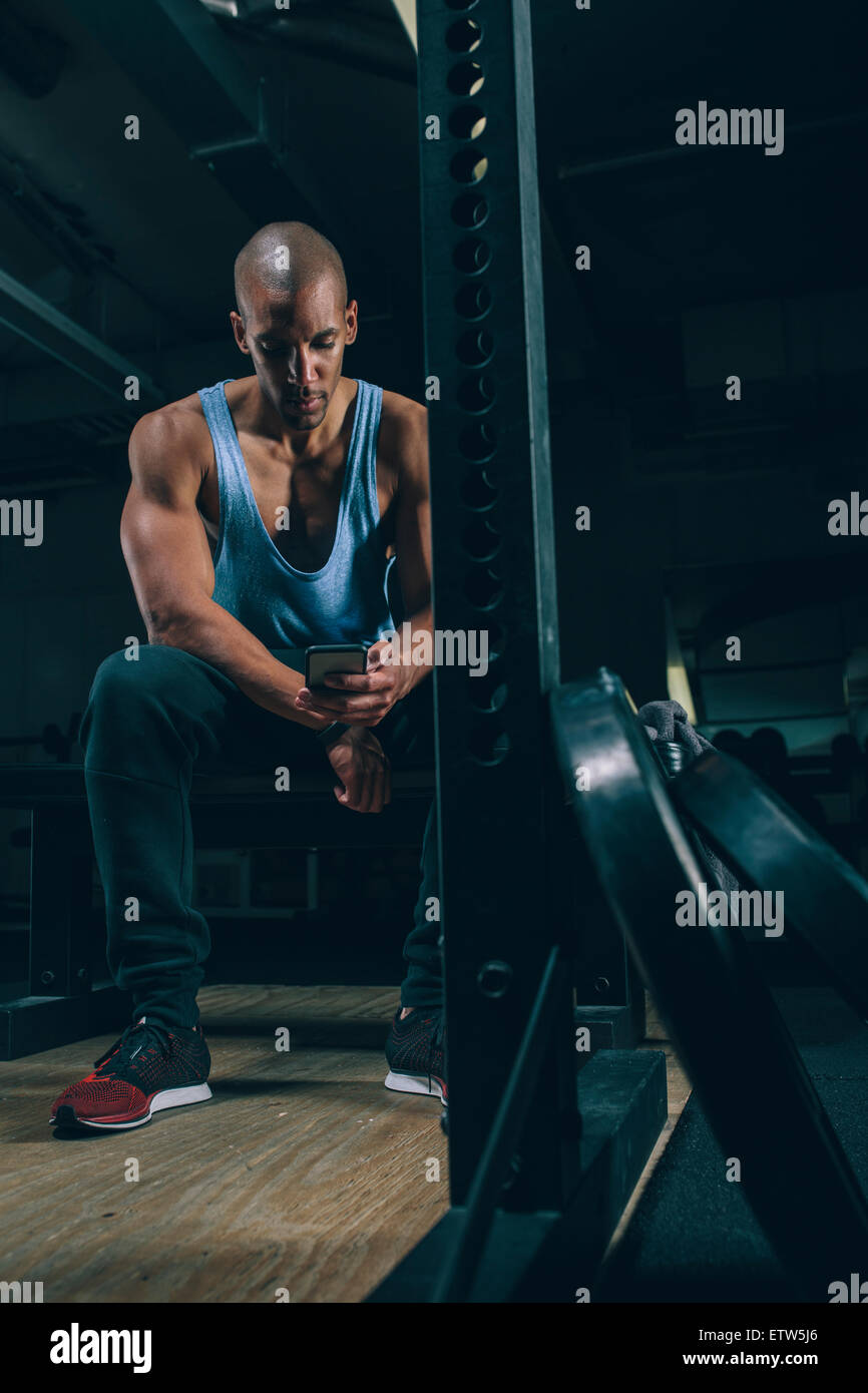 Muscular young bodybuilder in relaxed hi-res stock photography and ...