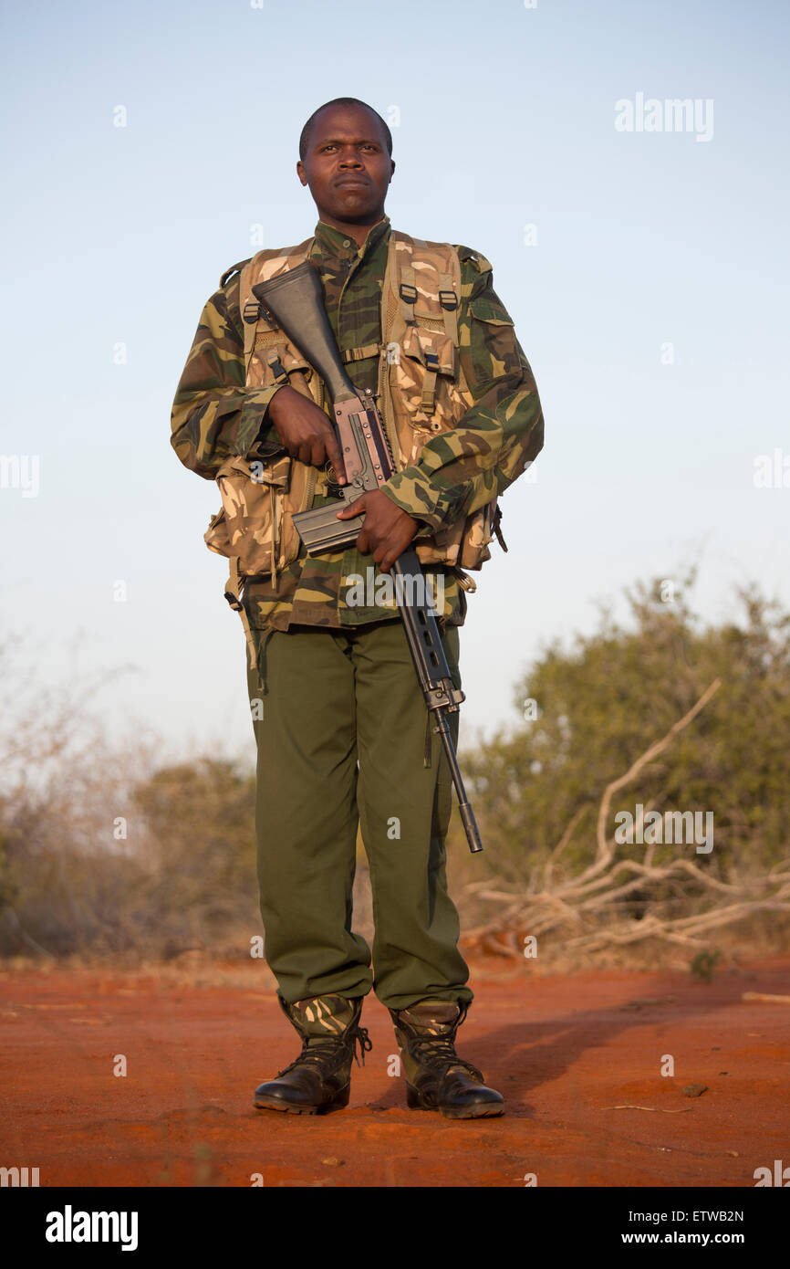 Kenya Wildlife Ranger Gilbert Gikos from the anti poaching unit pose ...