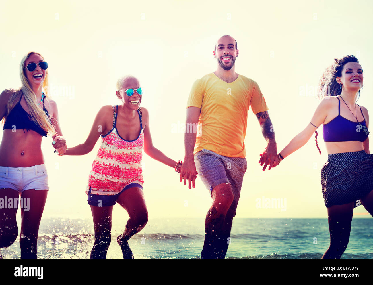 Diverse Beach Summer Friends Holding Hands Concept Stock Photo - Alamy